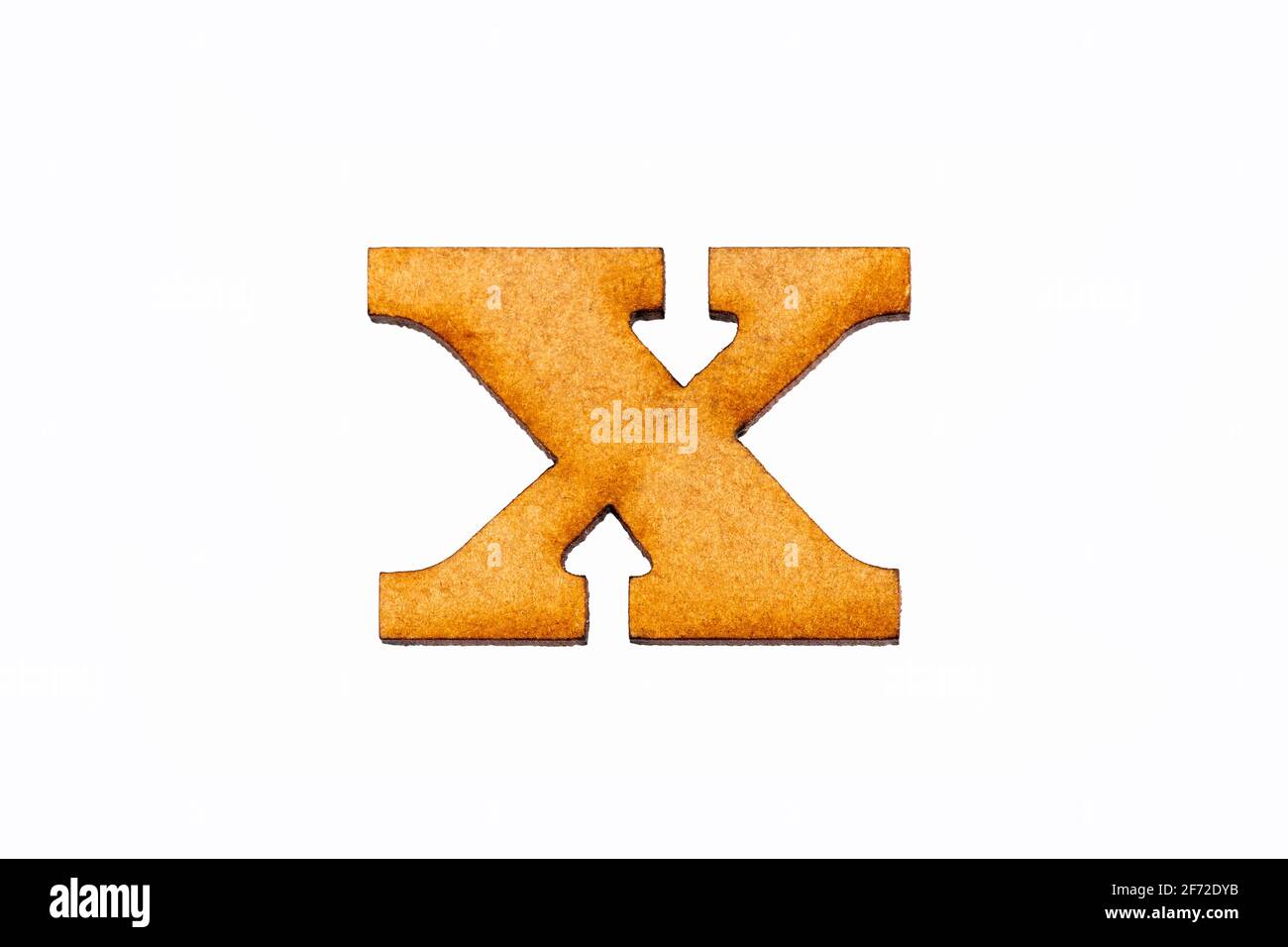 Lowercase letter x - Piece in wood Stock Photo - Alamy