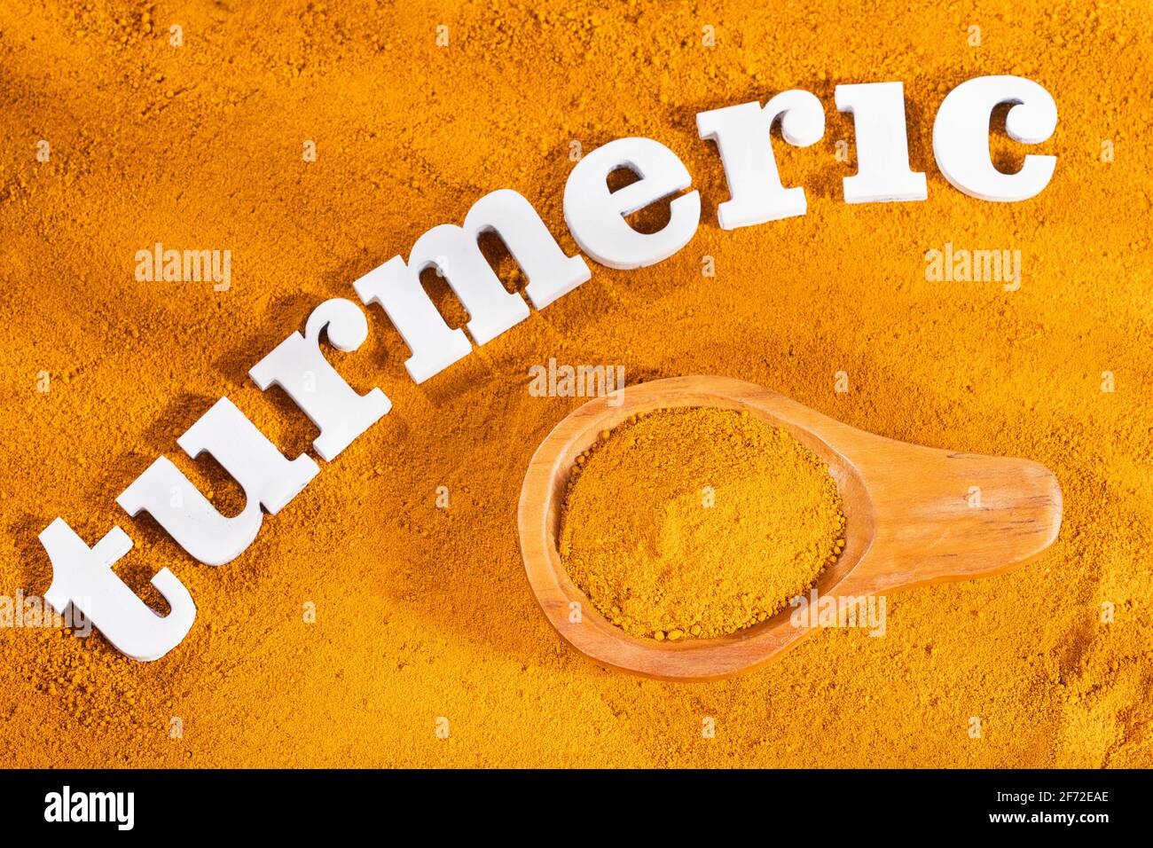 Curcuma longa - Organic turmeric powder. Text space Stock Photo - Alamy
