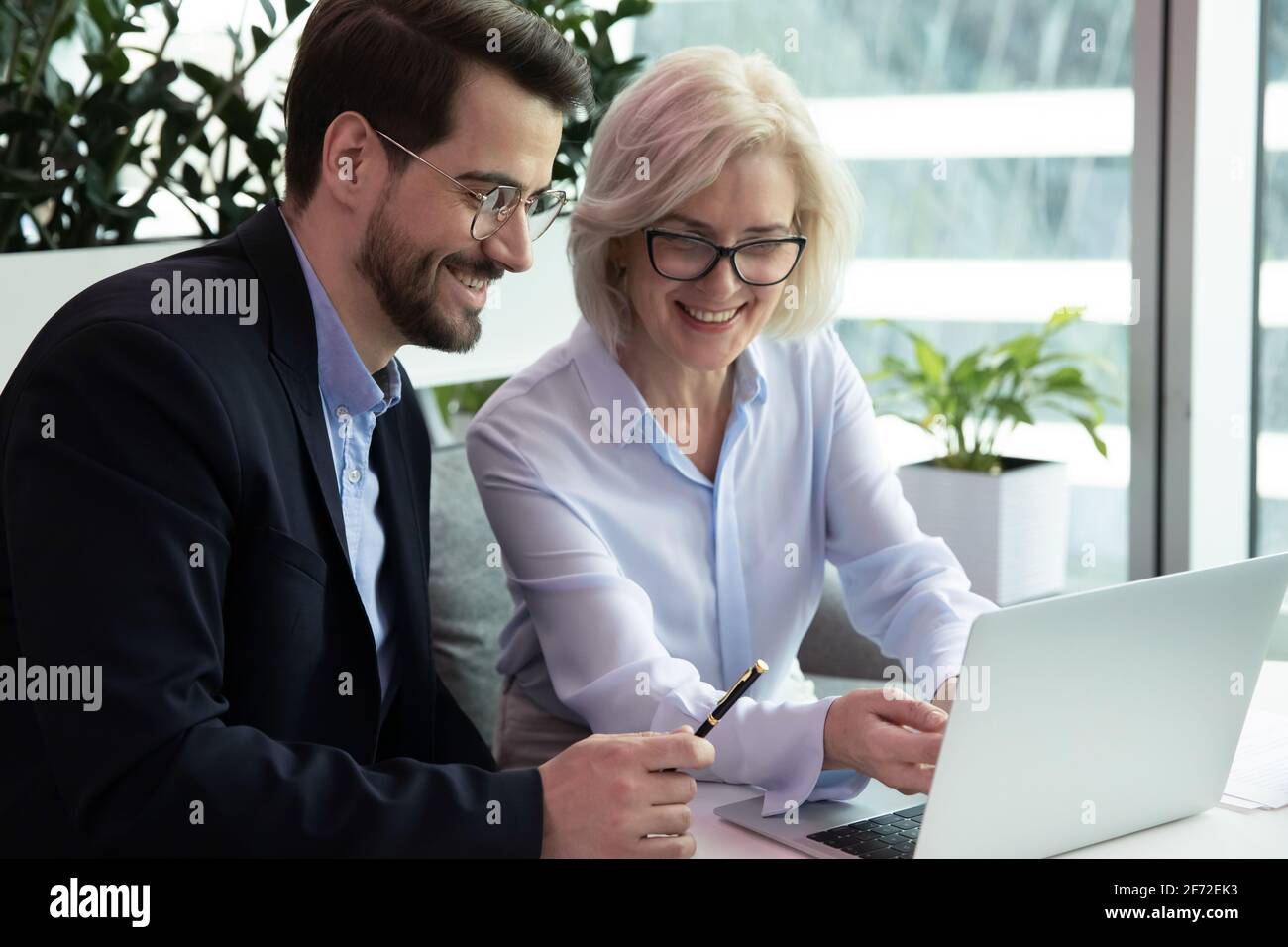 Diverse female colleagues cooperate hi-res stock photography and images ...