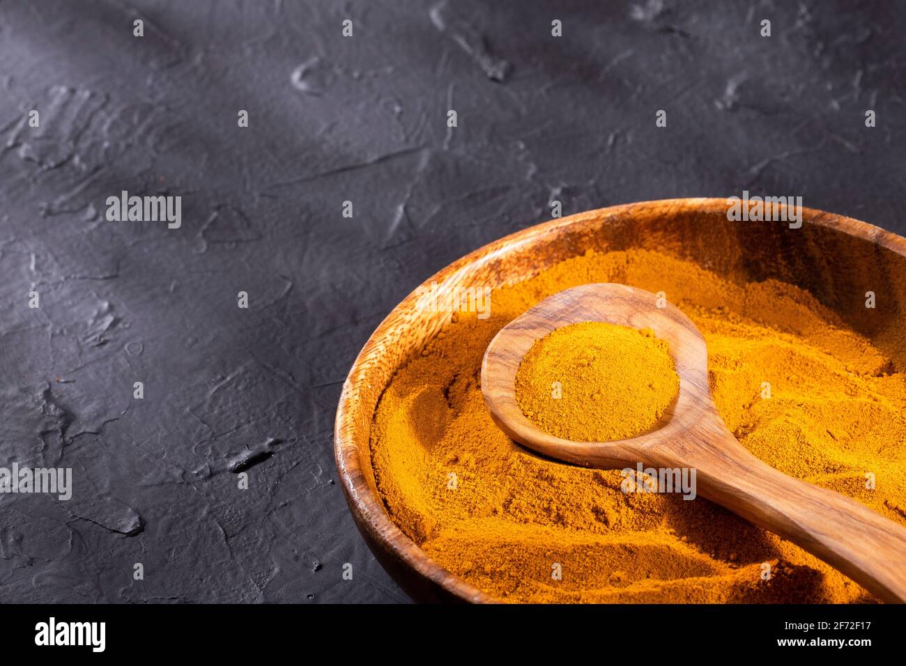 Organic turmeric powder - Curcuma longa Stock Photo - Alamy