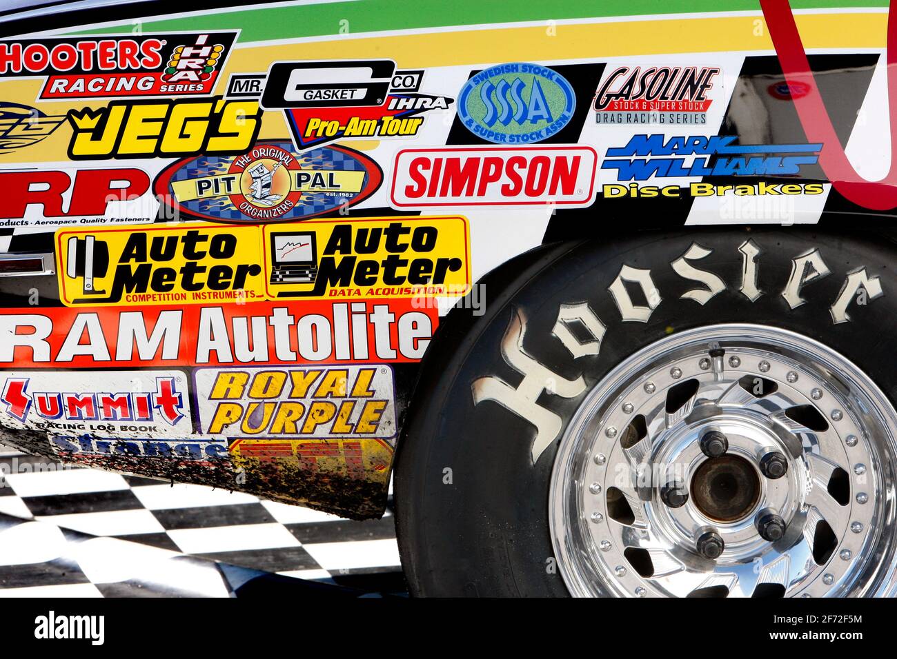 Race car, at a race track, with stickers on Stock Photo - Alamy