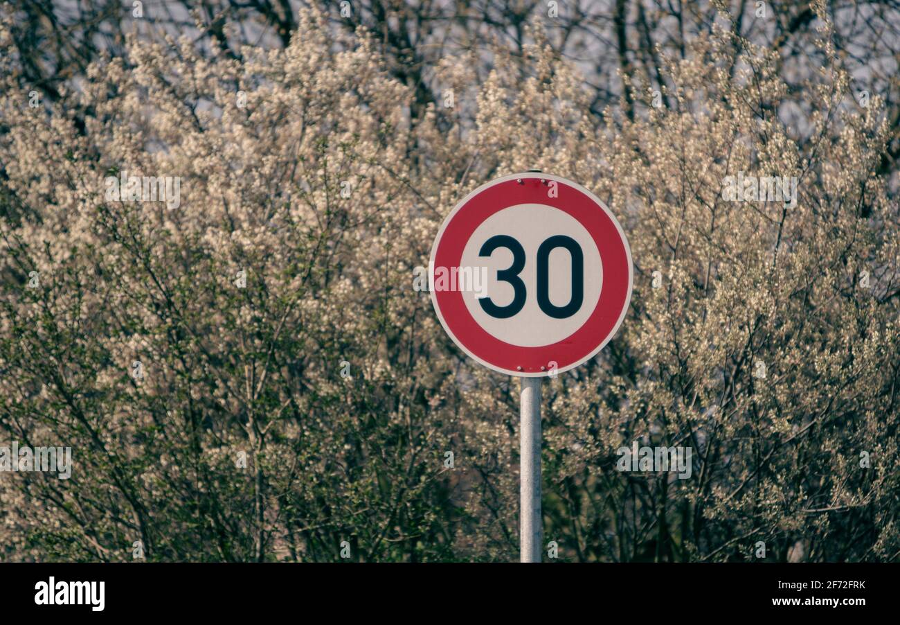 german road sign for speed limit 30 kmh Stock Photo - Alamy