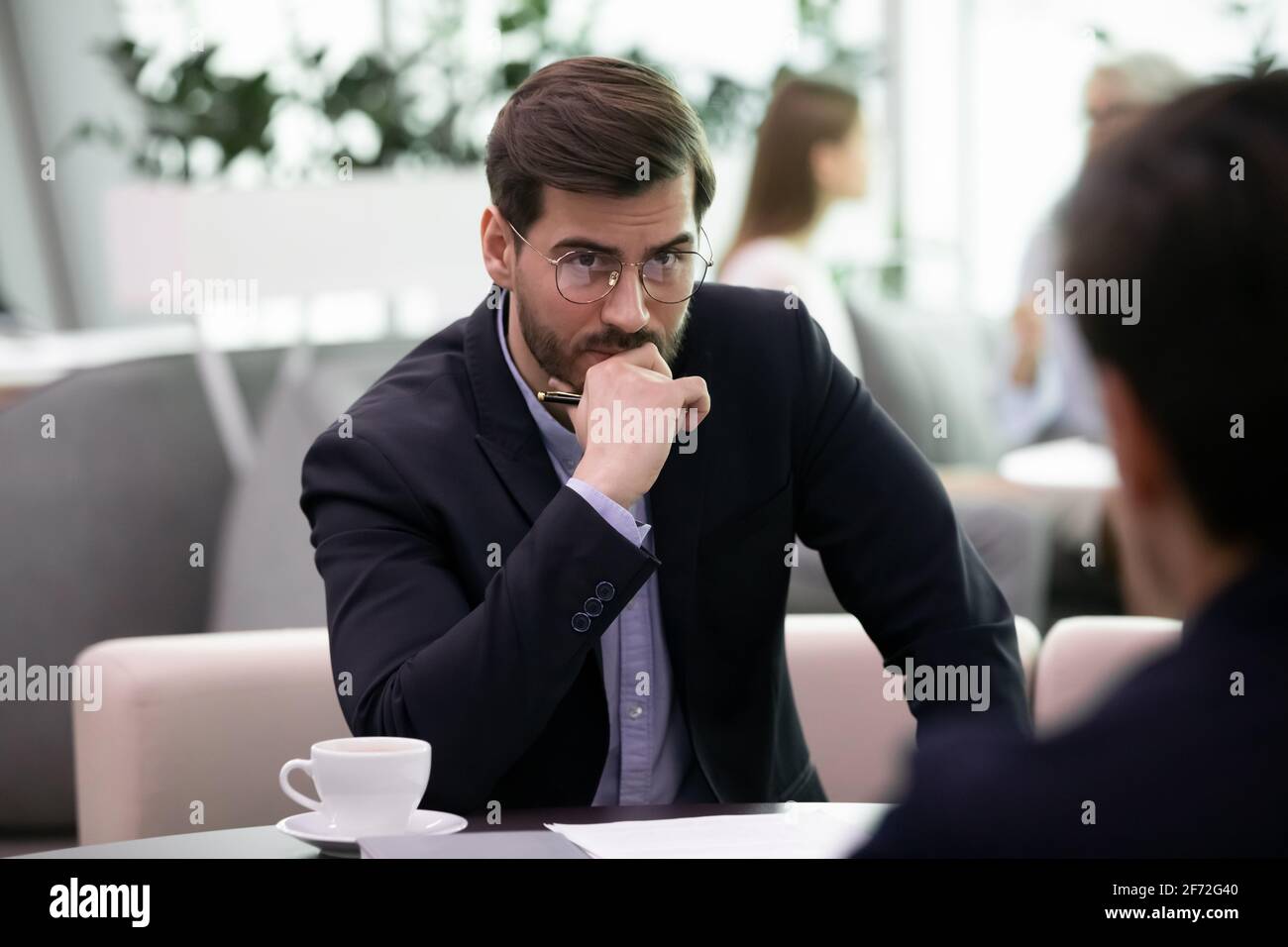 Doubtful employee hi-res stock photography and images - Alamy