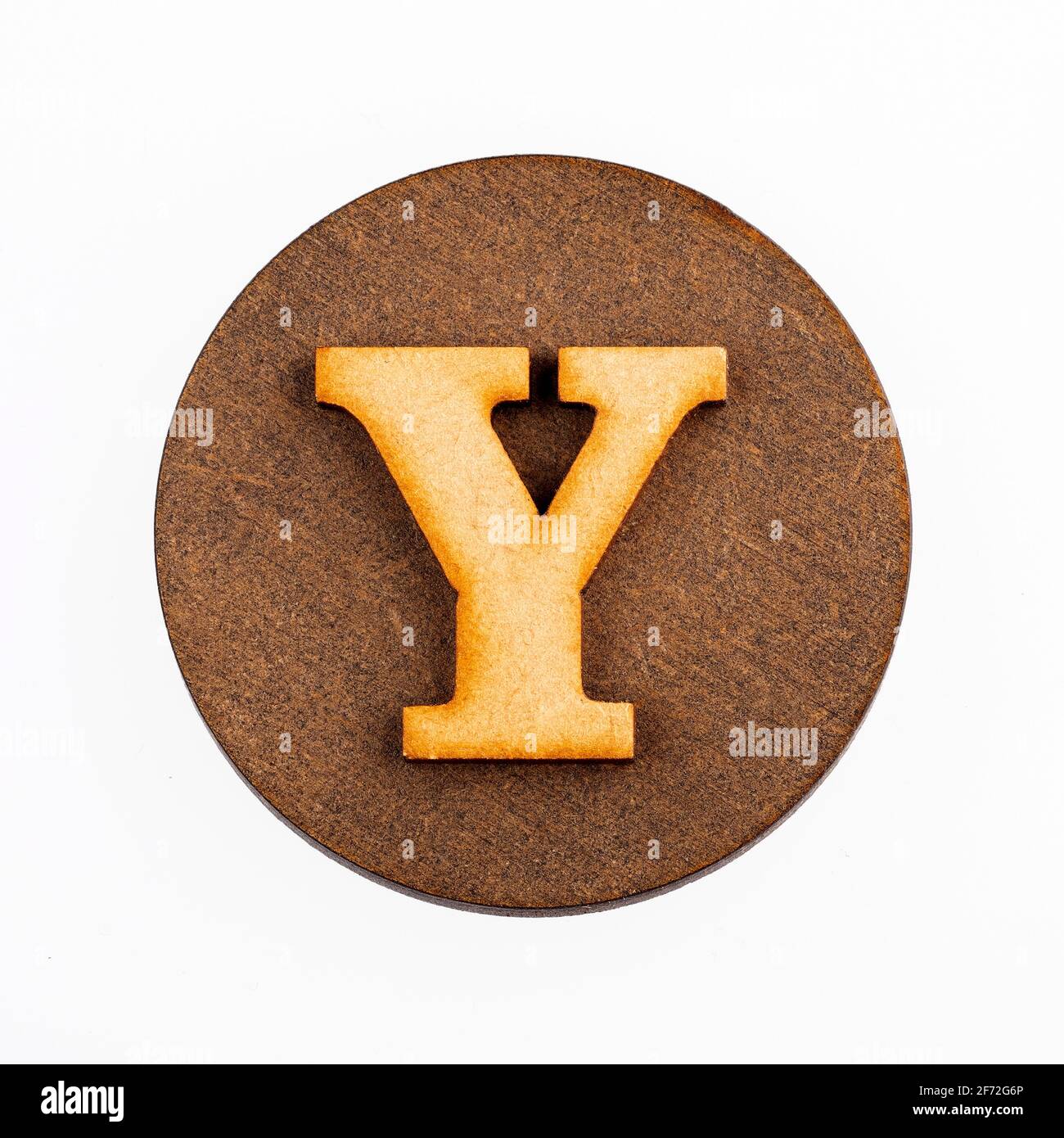 Letter Y on a wood circle - Alphabet Stock Photo - Alamy