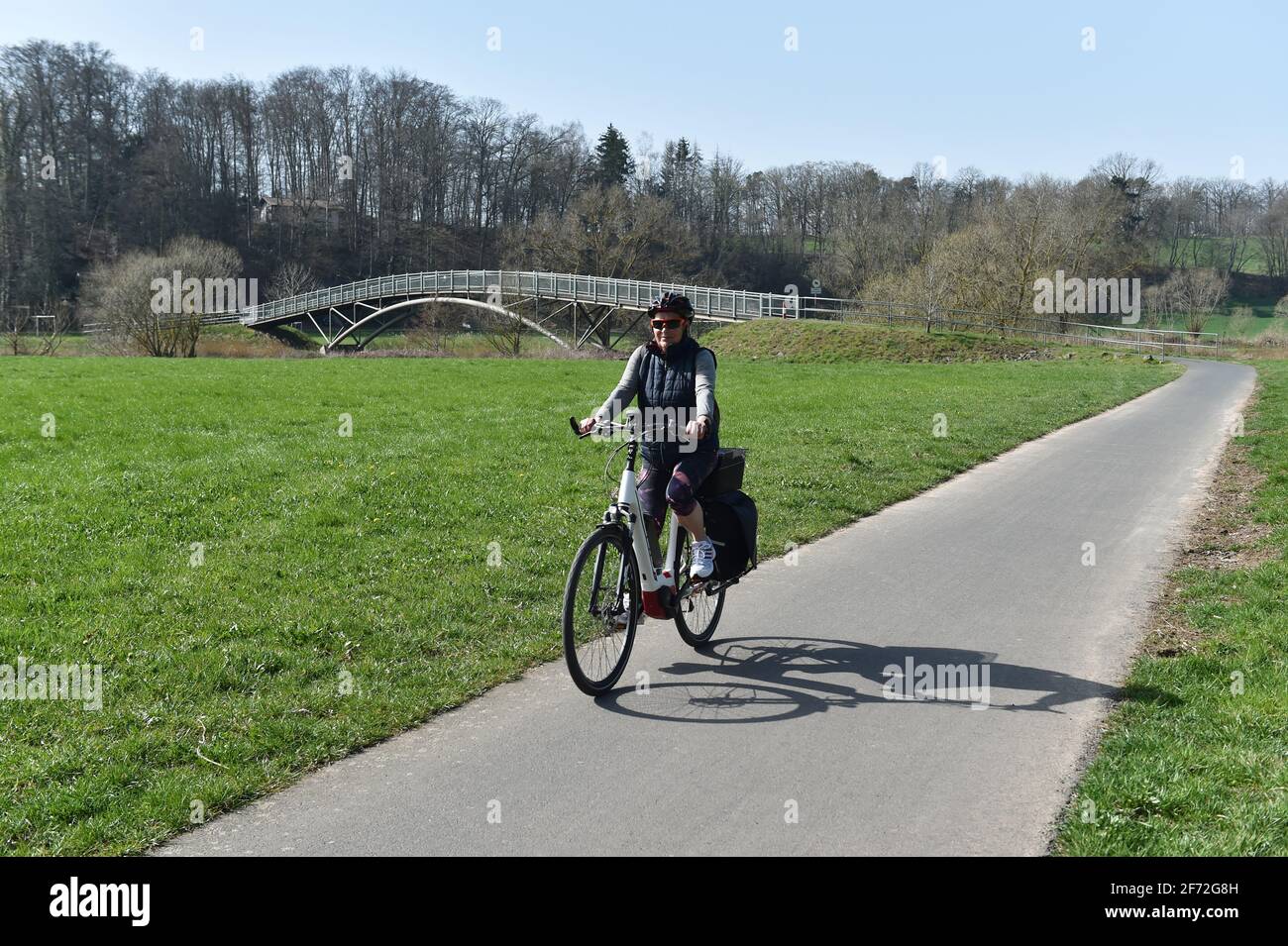 Woman ebike cycling hi-res stock photography and images - Alamy