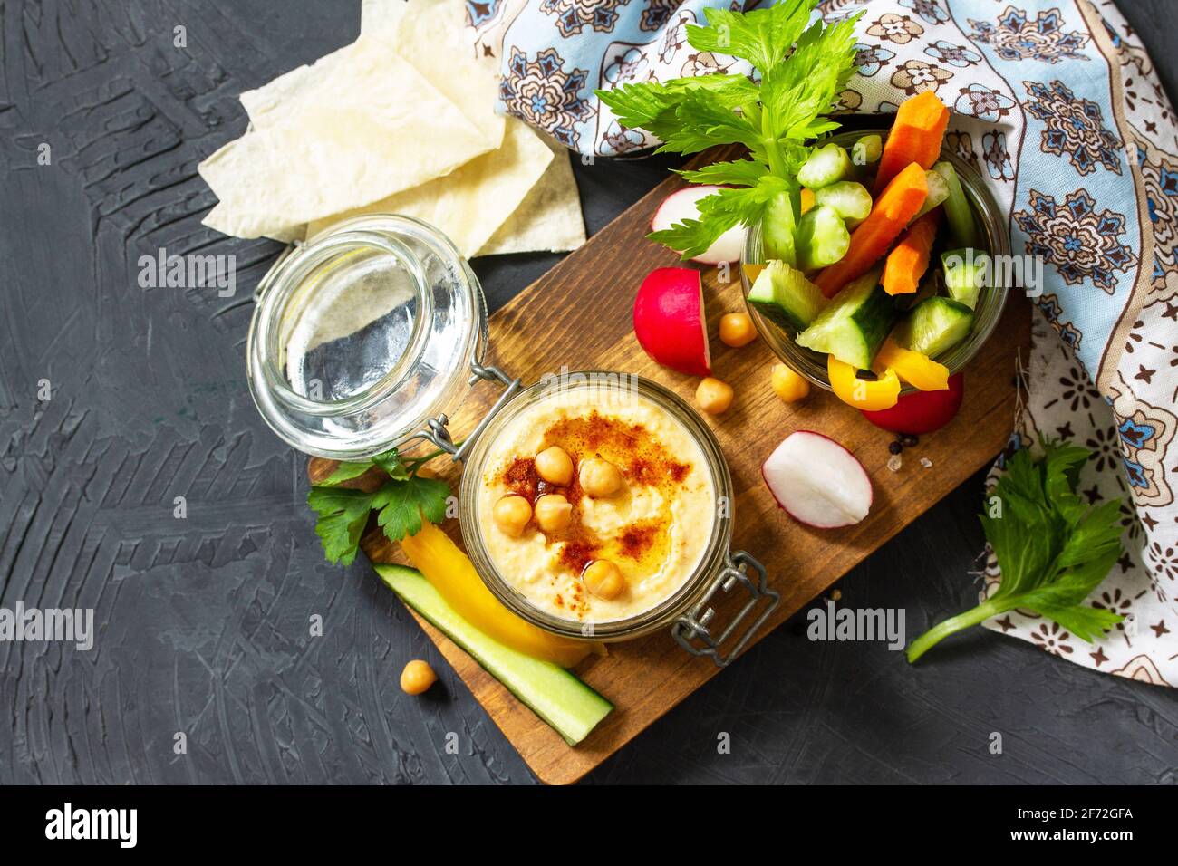 Arabic Cuisine. Middle Eastern Hummus with snacks. Hummus dip with ...