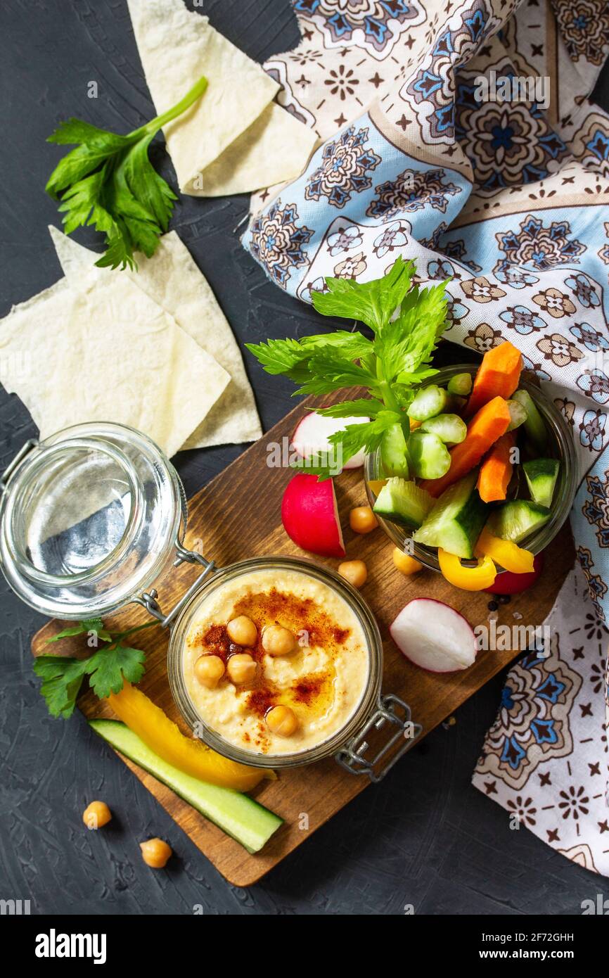 Arabic Cuisine. Middle Eastern Hummus with snacks. Hummus dip with ...