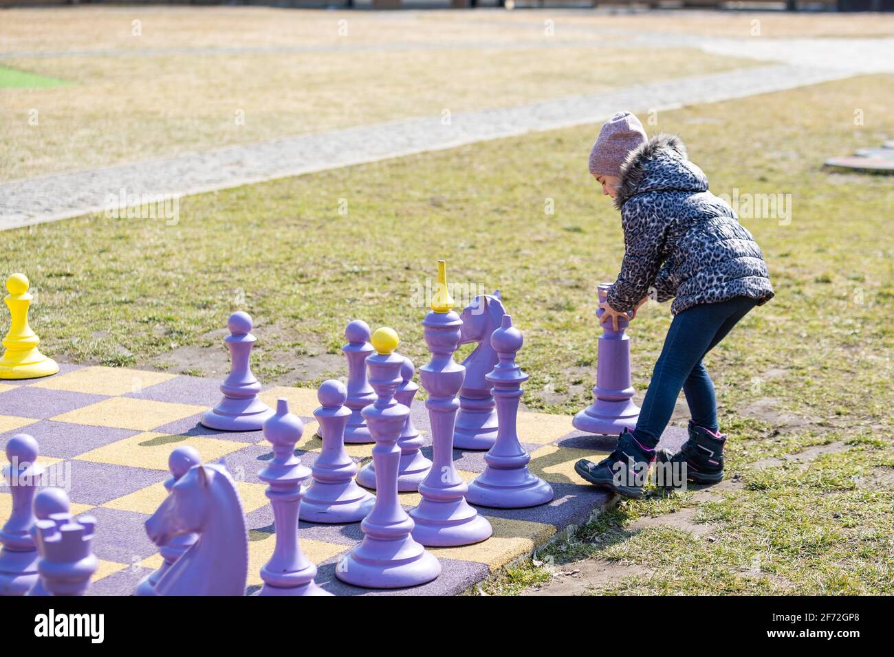 Child playing giant chess game hi-res stock photography and images - Alamy