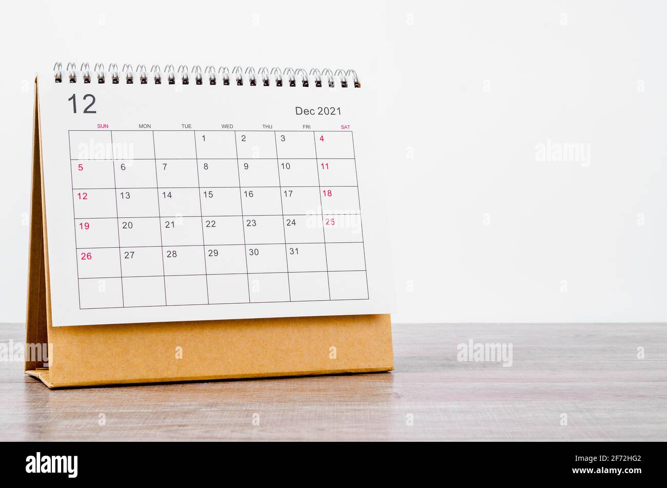 December Calendar 2021 on wooden table background Stock Photo - Alamy