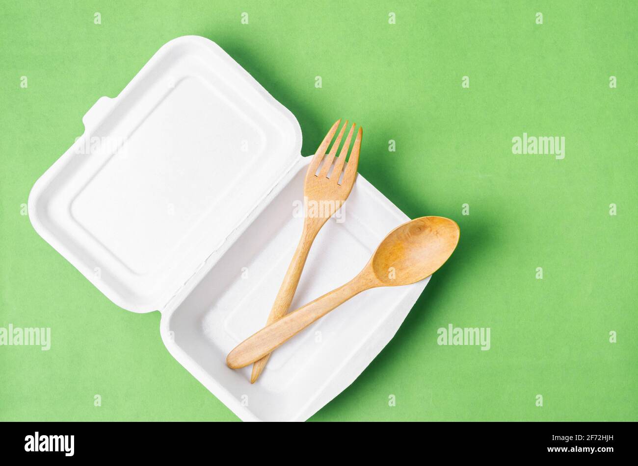 Eco friendly biodegradable paper disposable for packaging food on green ...