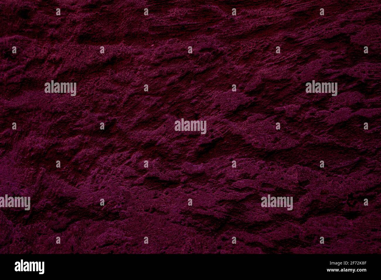 Crimson colored wall background with textures of different shades of ...