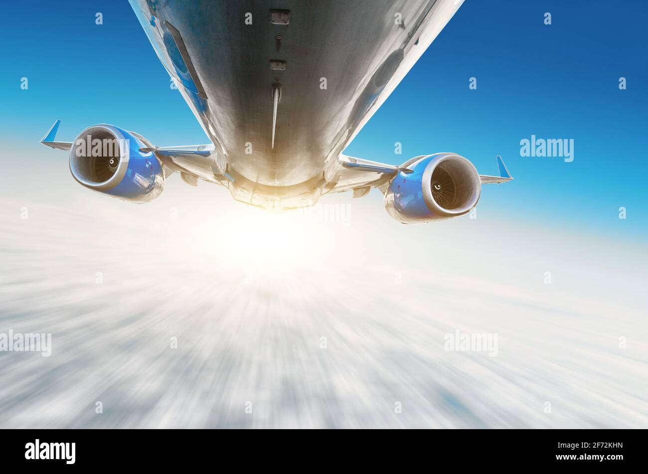Airplane flies over the clouds in the sky. View of the fuselage, wings ...