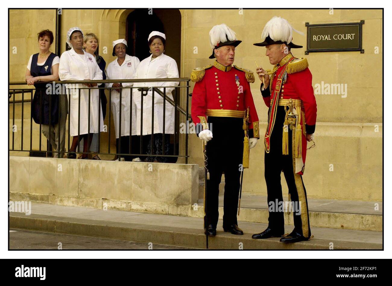CAPTAINS OF THE YEOMAN GUARDS STAND WAITING FOR THE EVENTS TO TAKE ...