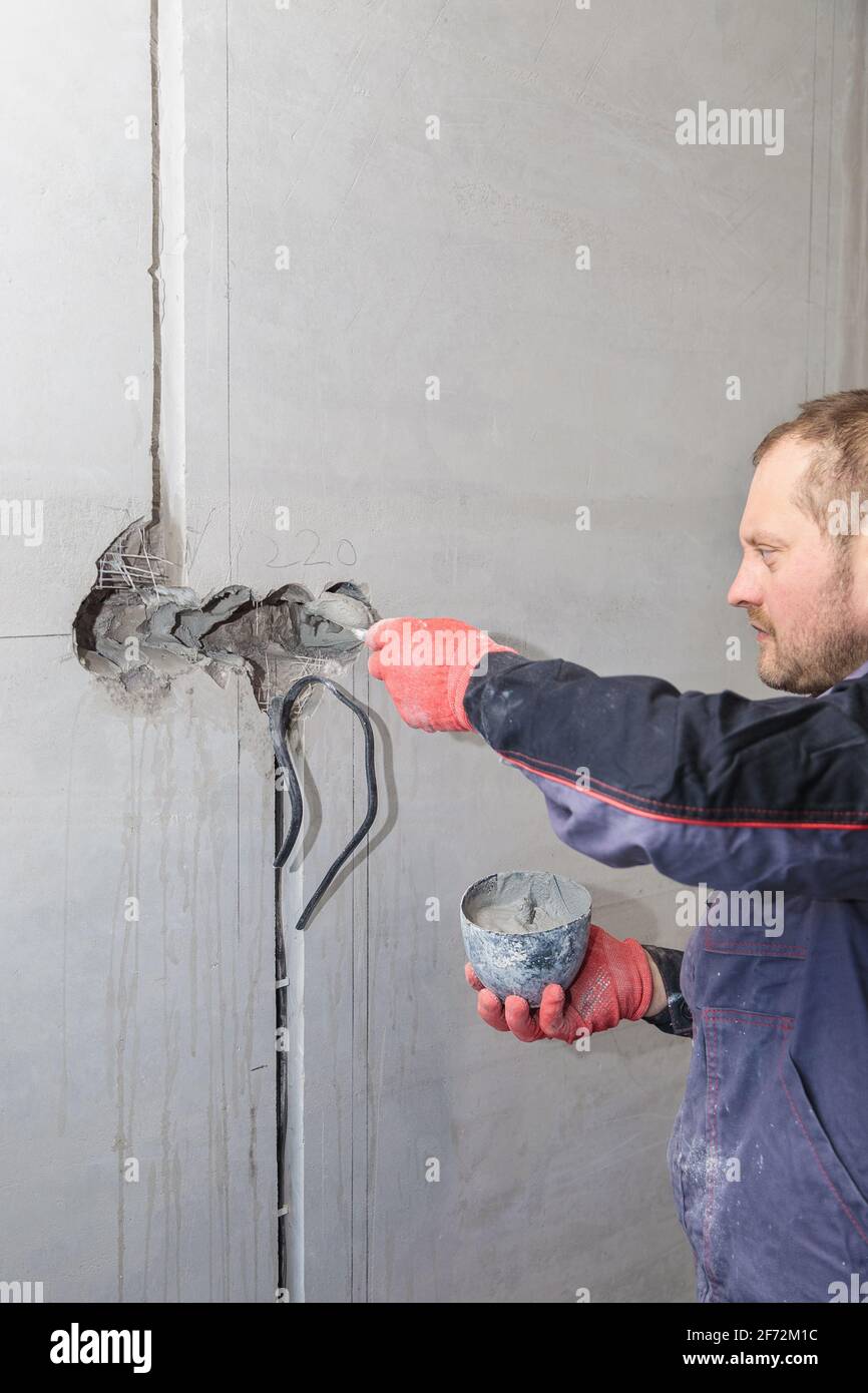 The electrician will plaster holes and channels for sockets and wires ...