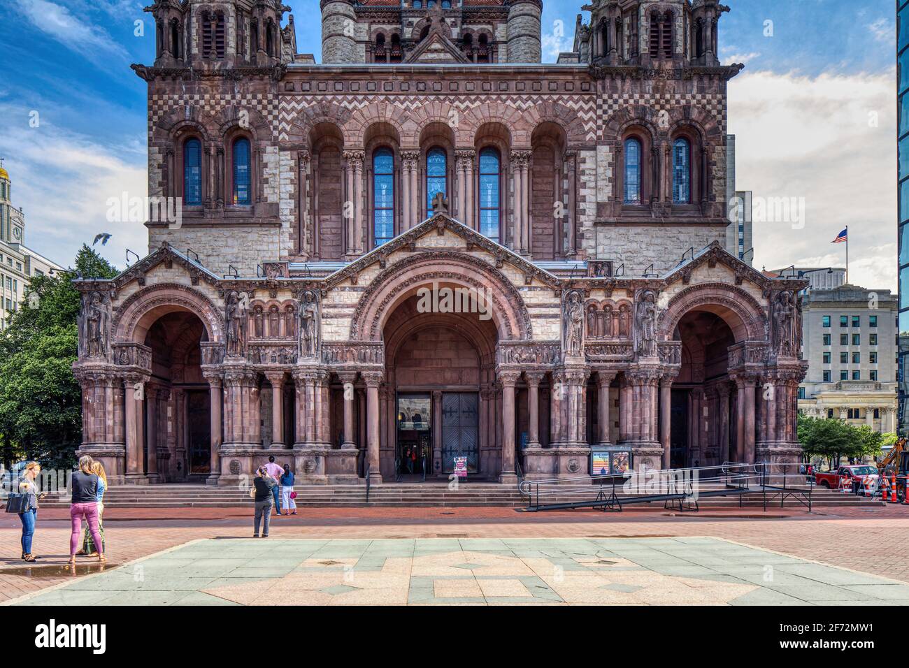 Trinity Church is at the eastern end of Copley Square, in the shadow of ...