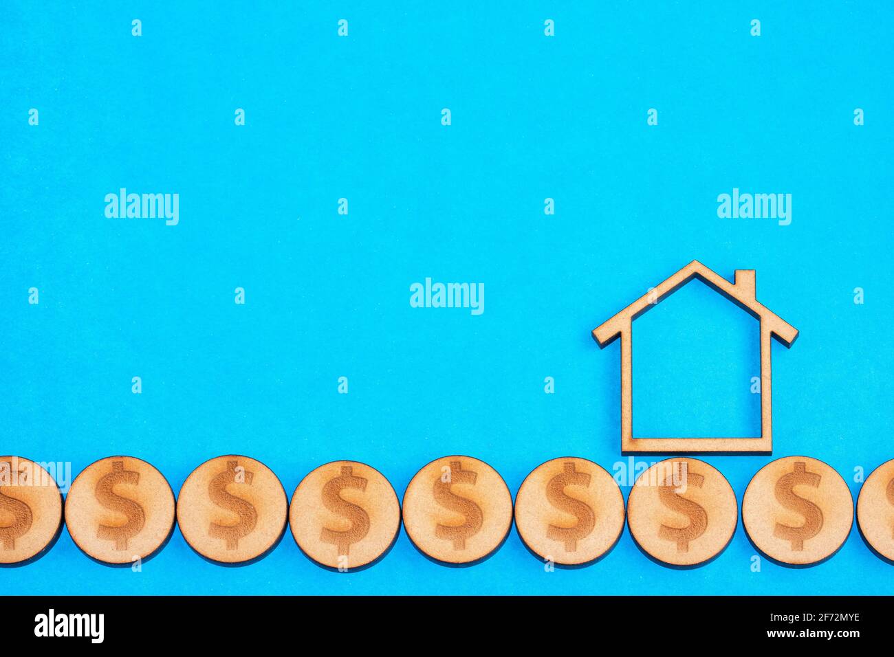 Concept of value of housing - Blue background Stock Photo - Alamy
