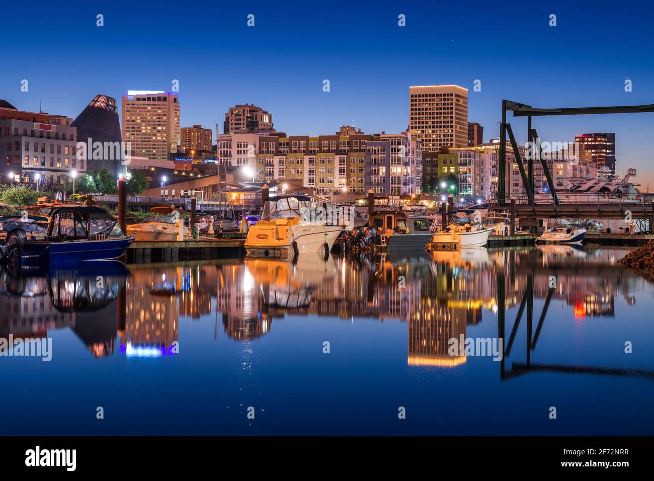 Tacoma, Washington, USA downtown skyline at dusk on Commencement Bay ...
