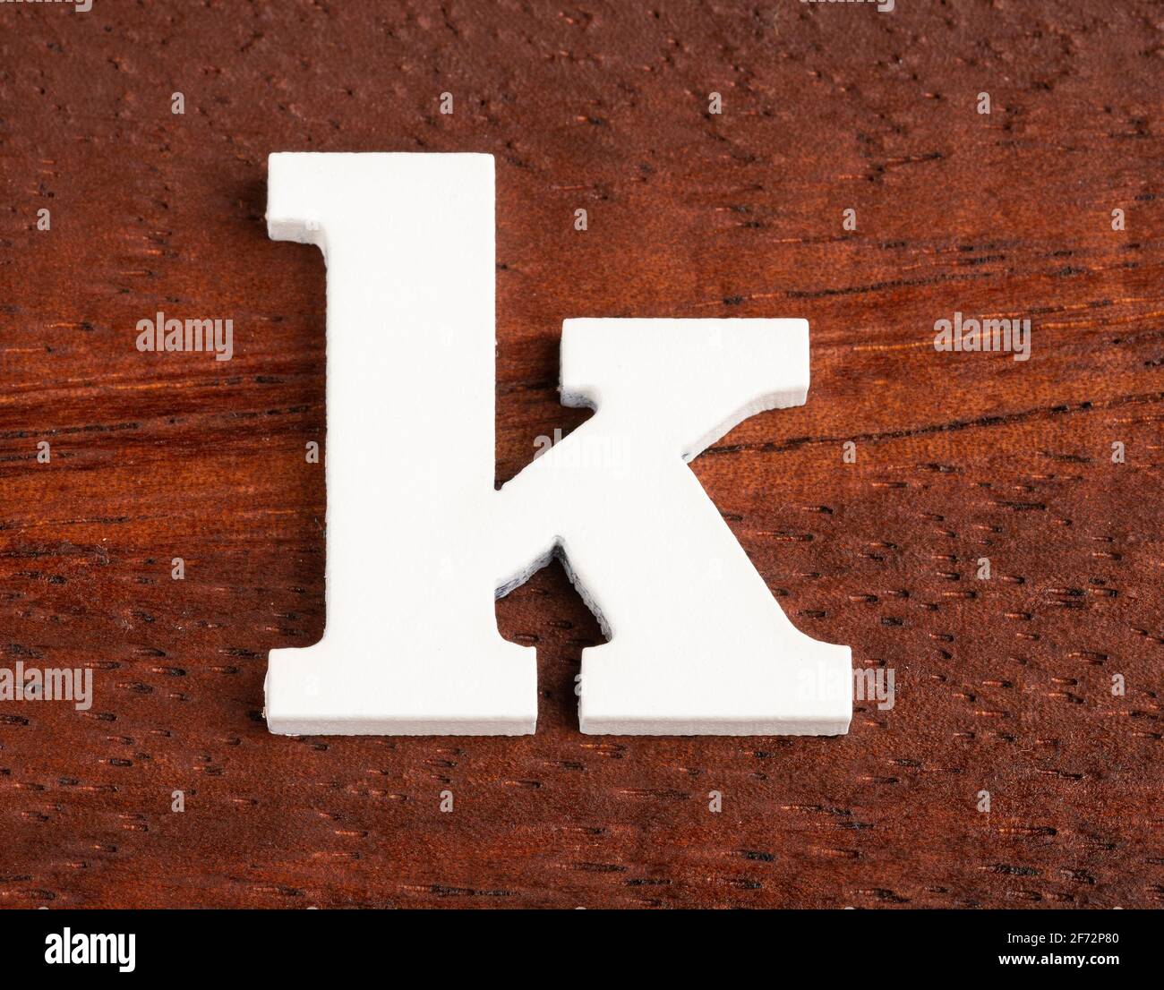 k - lowercase letter. Piece in wood Stock Photo - Alamy