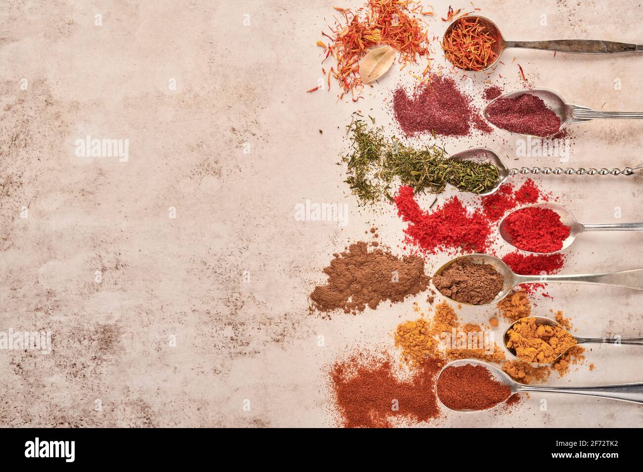 Colorful herbs and spices for cooking: turmeric, dill, paprika ...