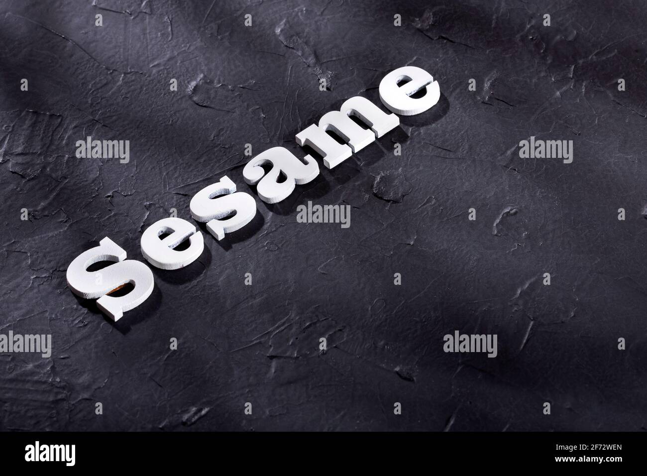Sesame word in white wooden letters - Sesamum indicum Stock Photo - Alamy