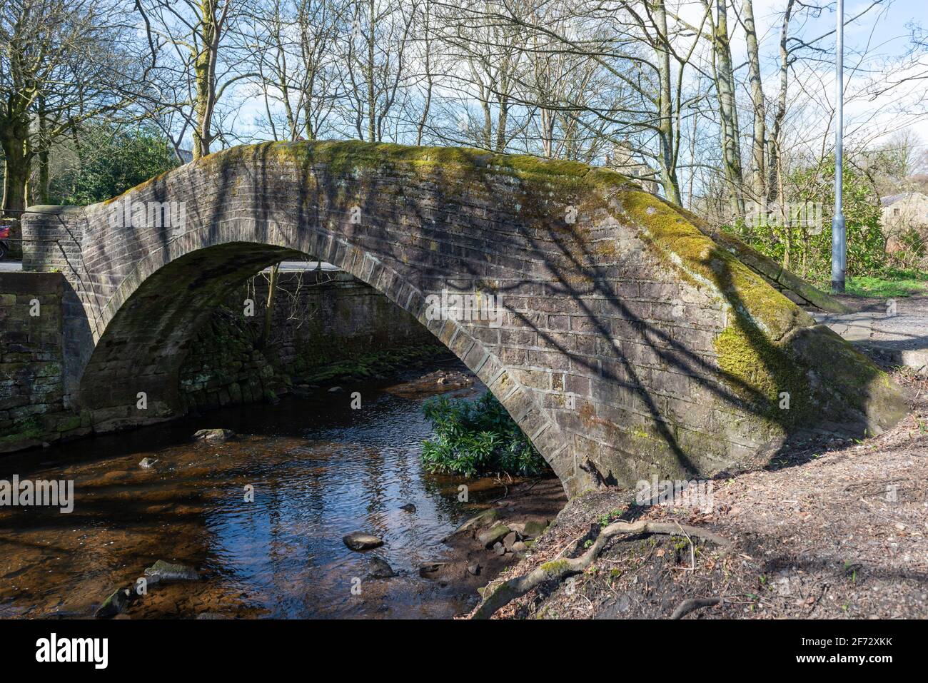 Mellor Bridge, an old packhorse bridge over the River Colne in Marsden ...