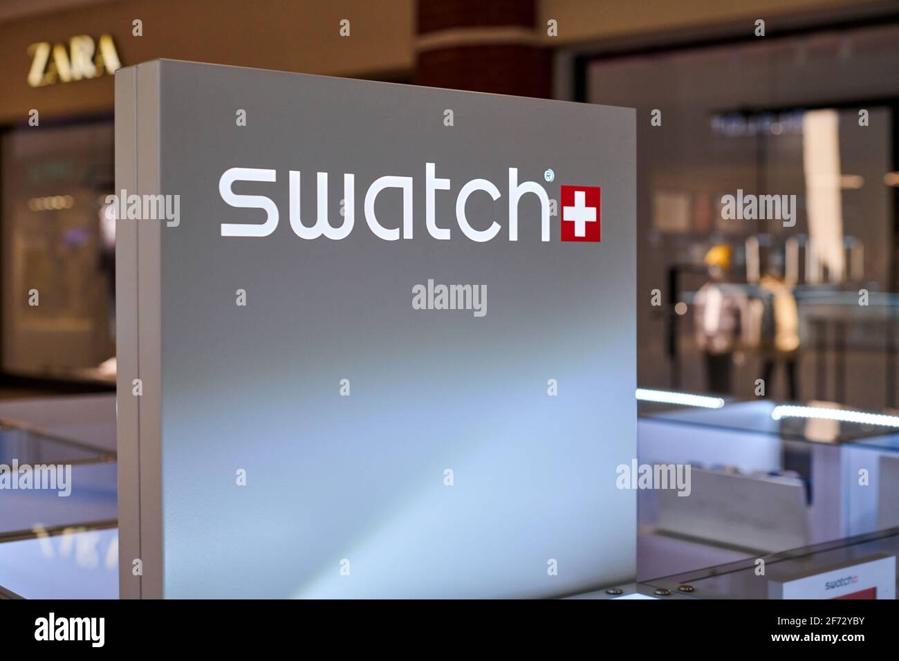 Russia, Kaliningrad - 02.15.2021 - Swatch, sign with logo lettering of ...
