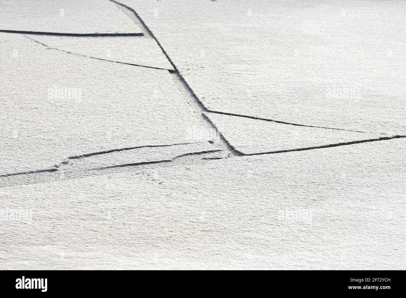Cracked ice on frozen floor hi-res stock photography and images - Alamy
