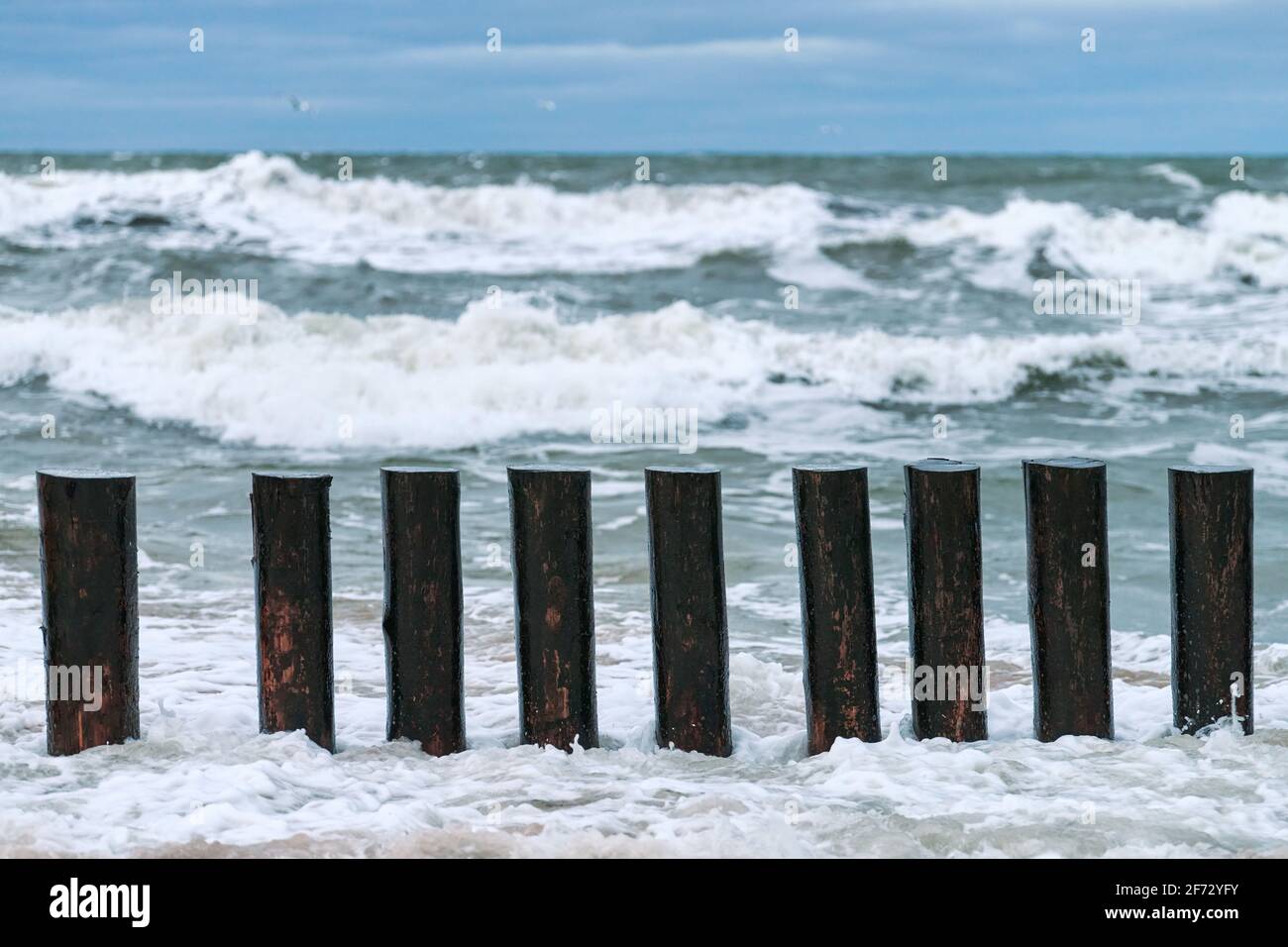 Waves Splashing Up The Groynes High Resolution Stock Photography and ...