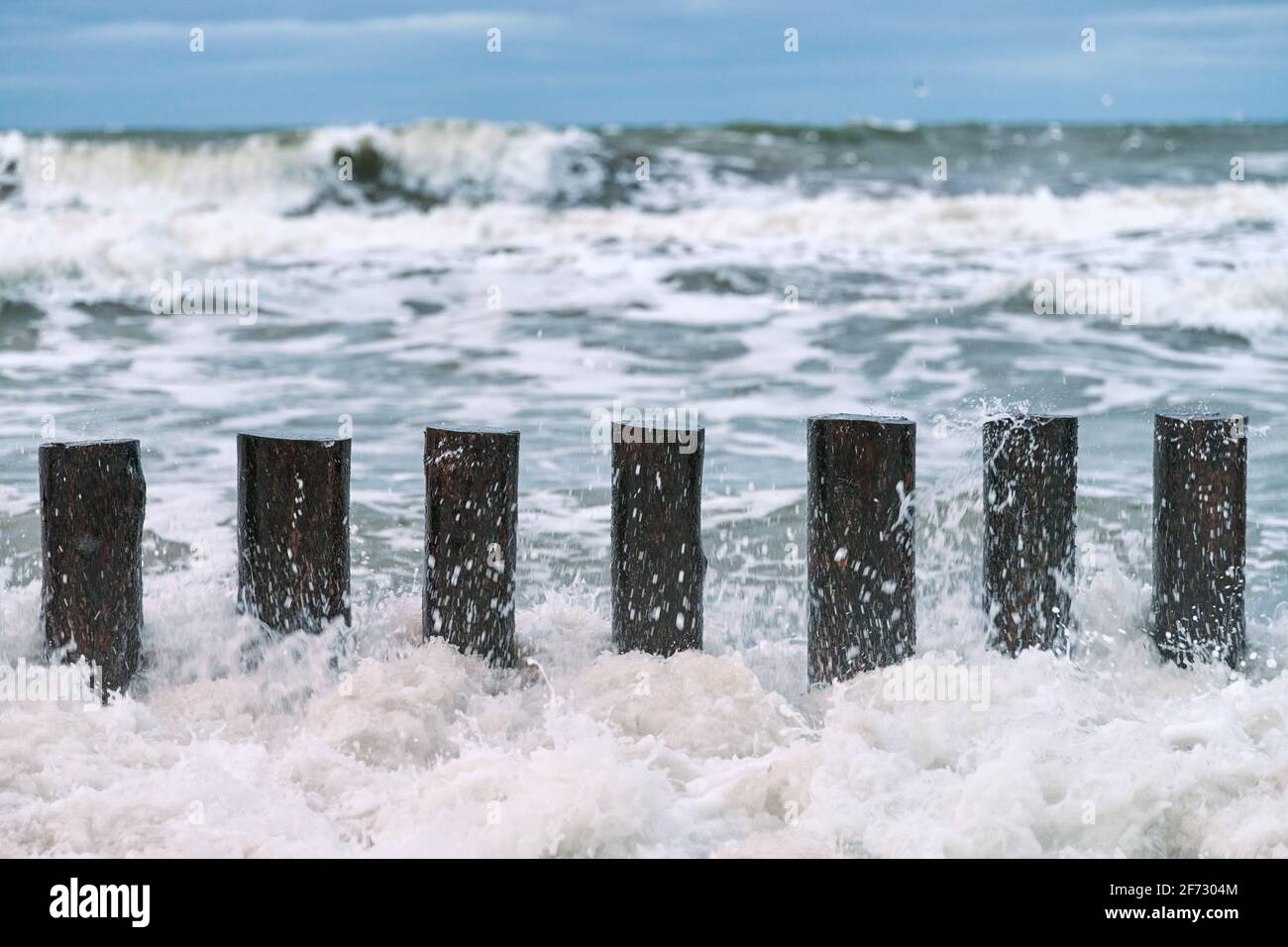 Waves Splashing Up The Groynes High Resolution Stock Photography and ...