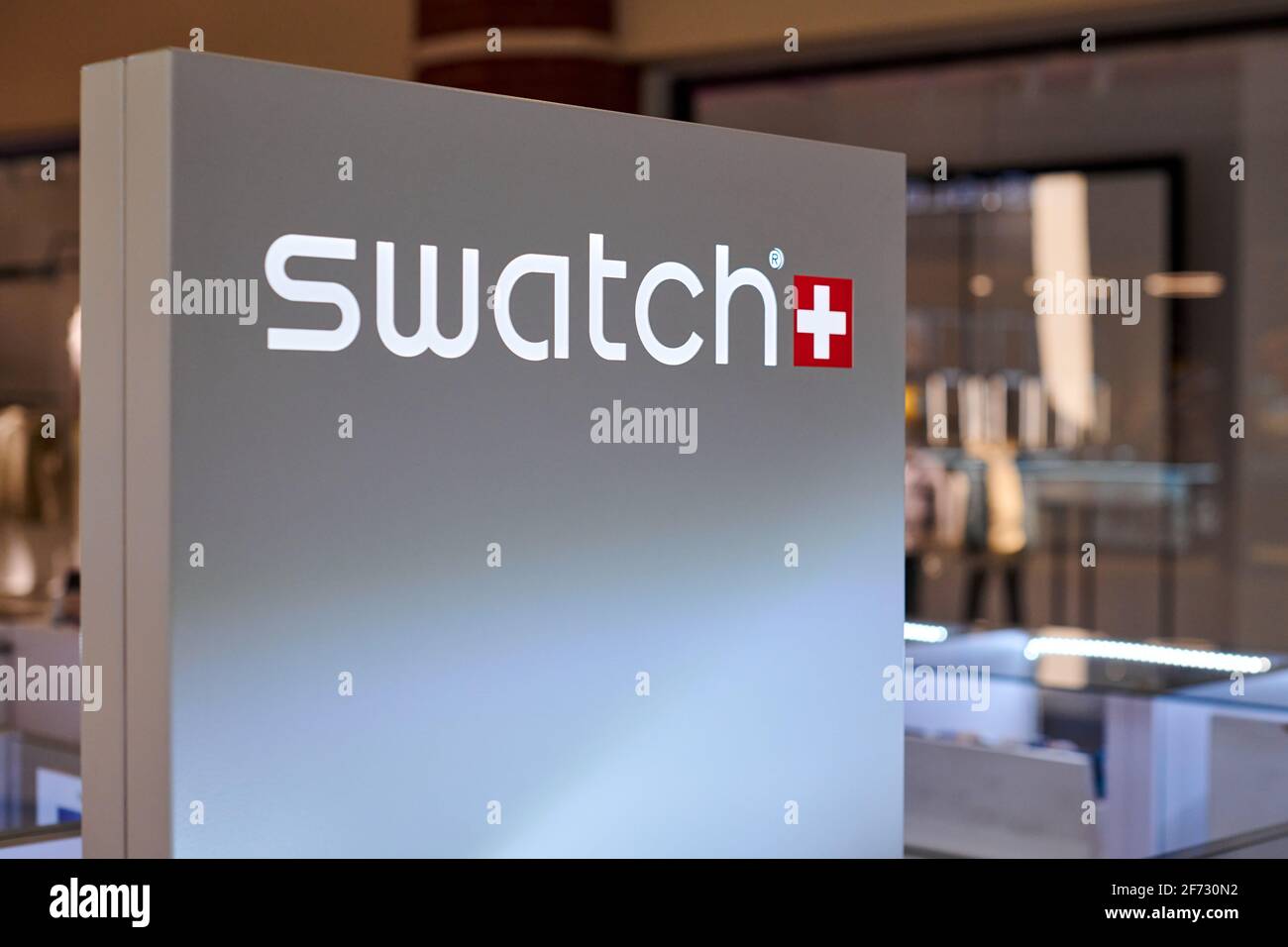 Russia, Kaliningrad - 02.15.2021 - Swatch, sign with logo lettering of ...