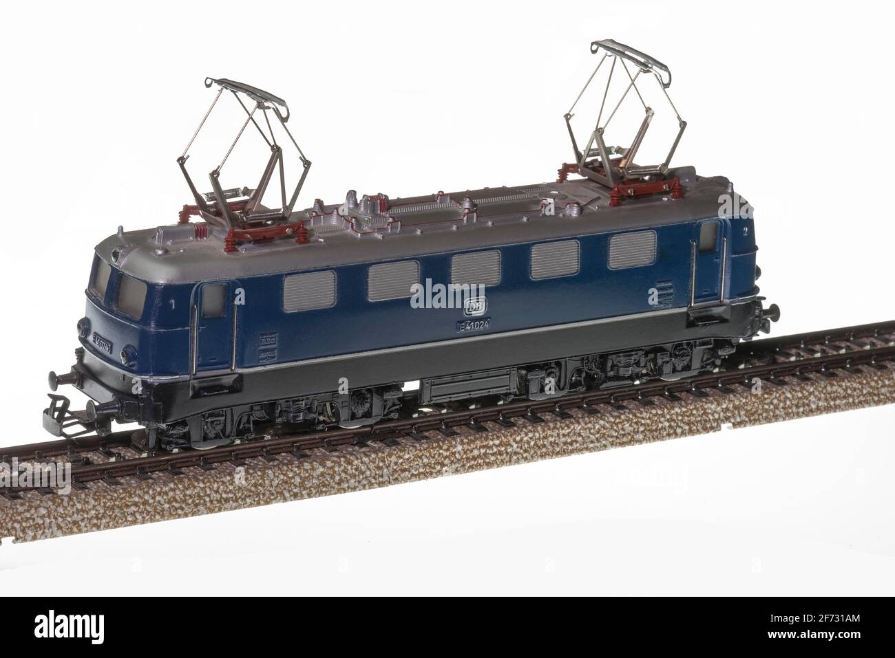 Electric locomotive Maerklin H0, DB class E 41 of the 1960s, on white ...