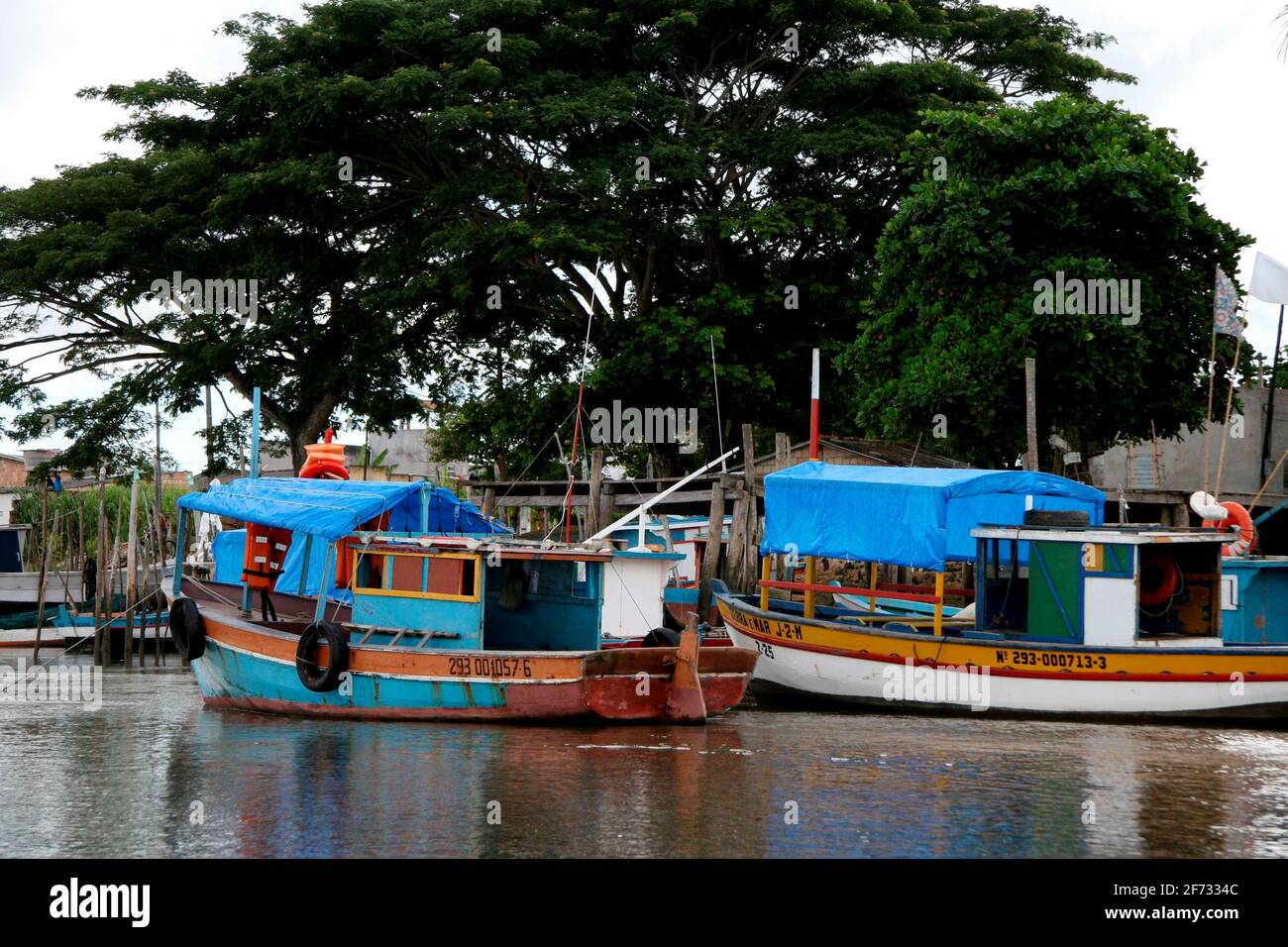 caravelas, bahia / brazil - march 25, 2008: fishing boats are seen near ...