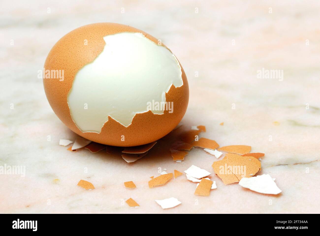 Hard boiled egg, partially peeled, hen's eggs, hen's egg, egg shell ...