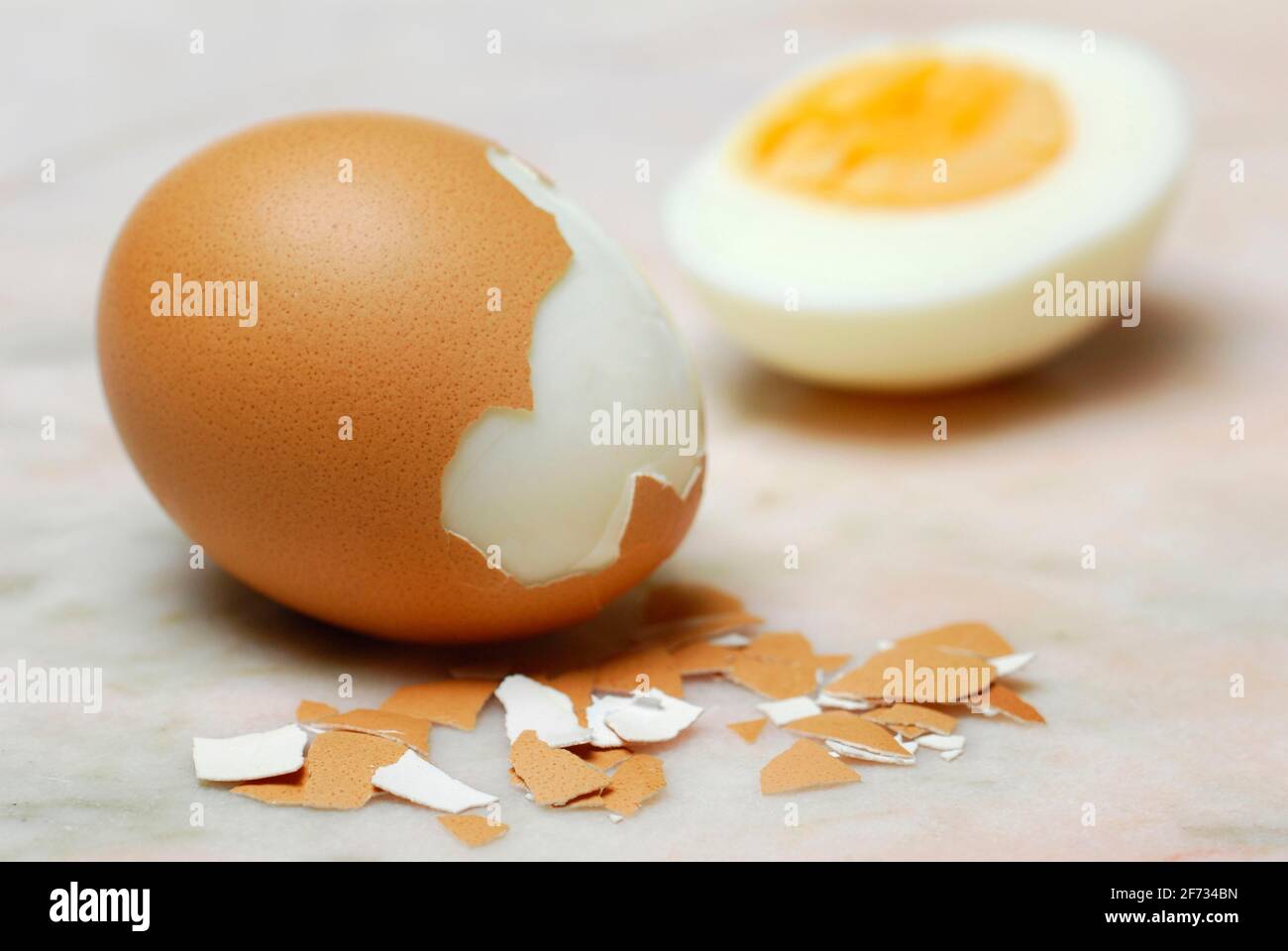 Hard boiled egg, partially peeled, hen's eggs, hen's egg, egg shell ...