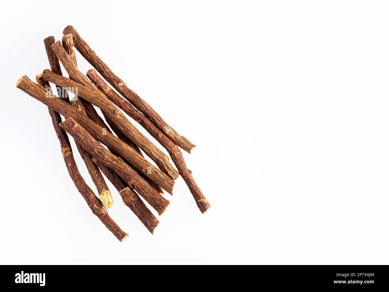 Licorice roots - Glycyrrhiza glabra - White background Stock Photo - Alamy