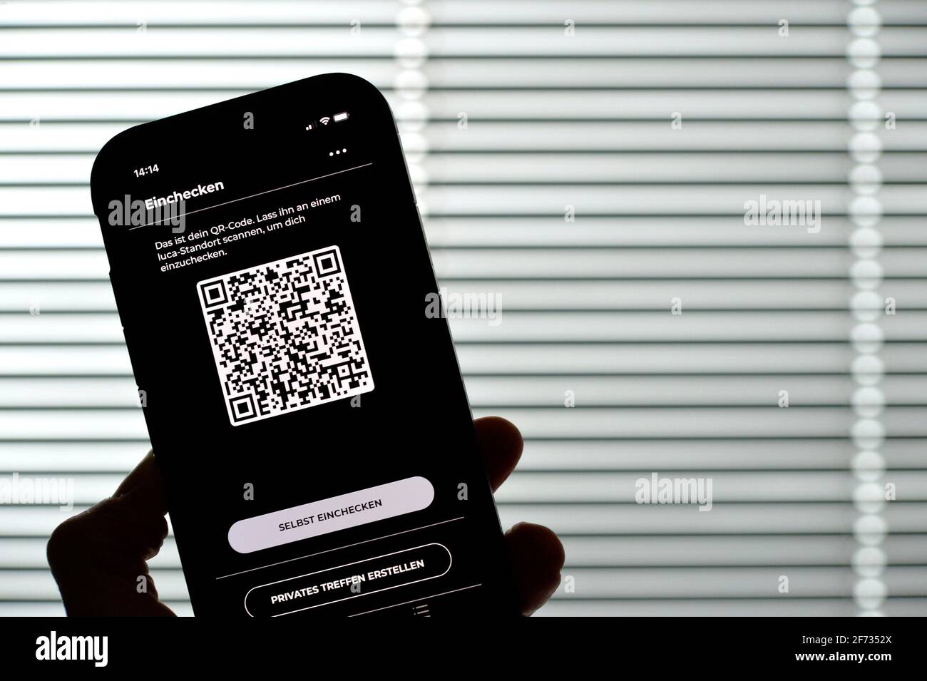 Luca app with QR code in front of window, shutter, Corona crisis ...