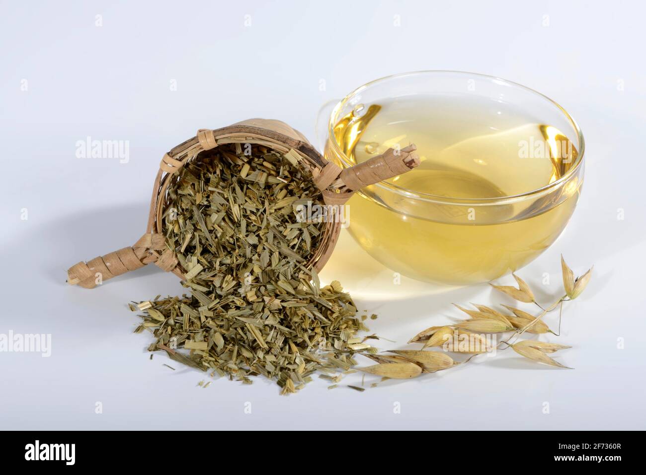 Cup oat straw tea (Avena sativa), oats, tea strainer Stock Photo - Alamy