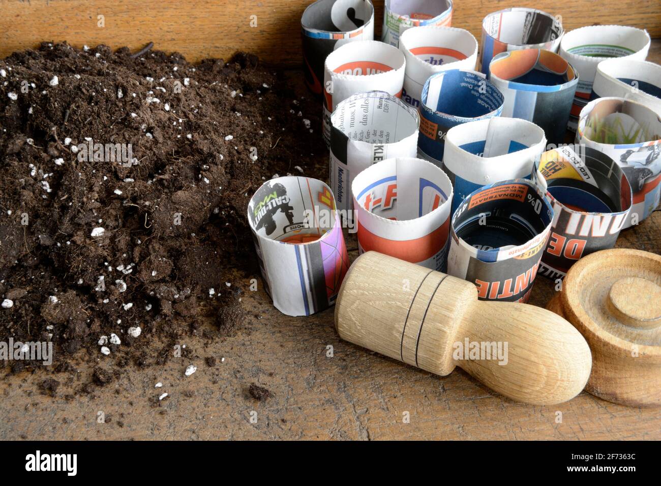 Production paper plant pot, potting soil Stock Photo - Alamy