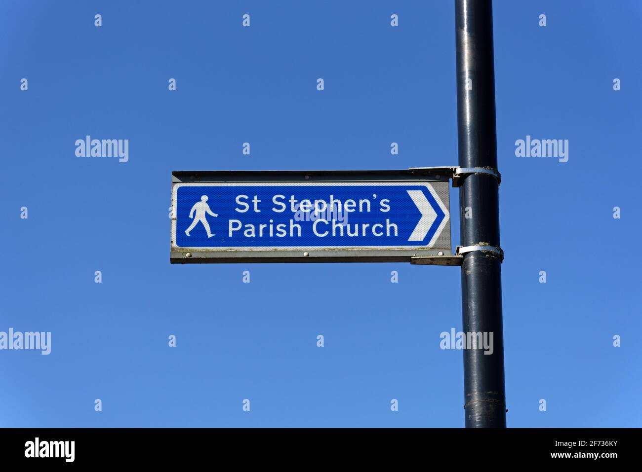 Pedestrian road sign giving directions to St Stephens parish Church ...