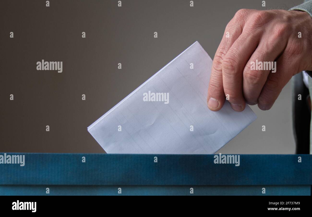 European Union parliament election concept - hand putting ballot in ...