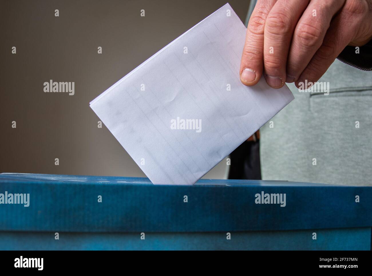 European Union parliament election concept - hand putting ballot in ...