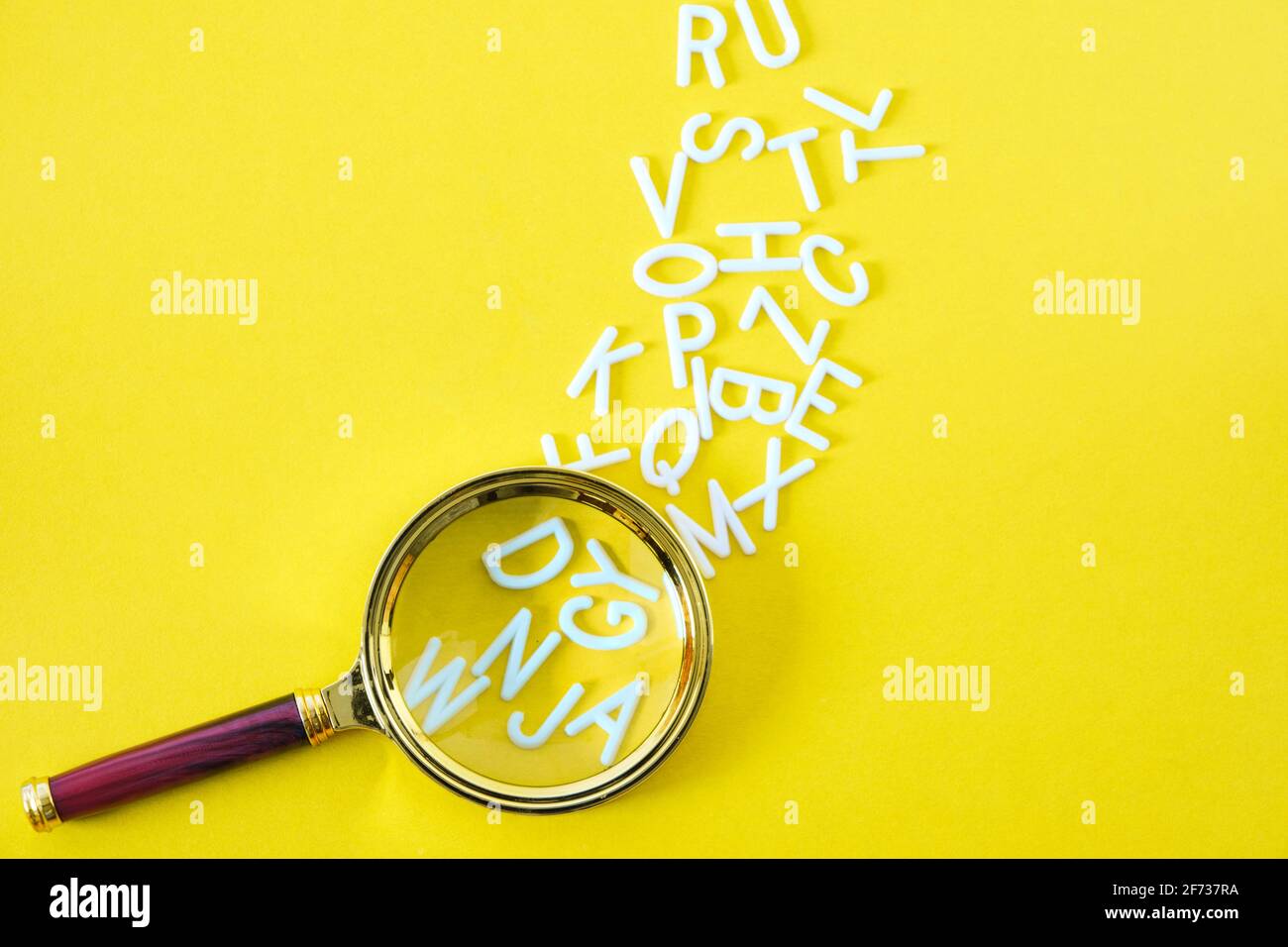Letters English alphabet fallout magnifying glass, concept of knowledge ...
