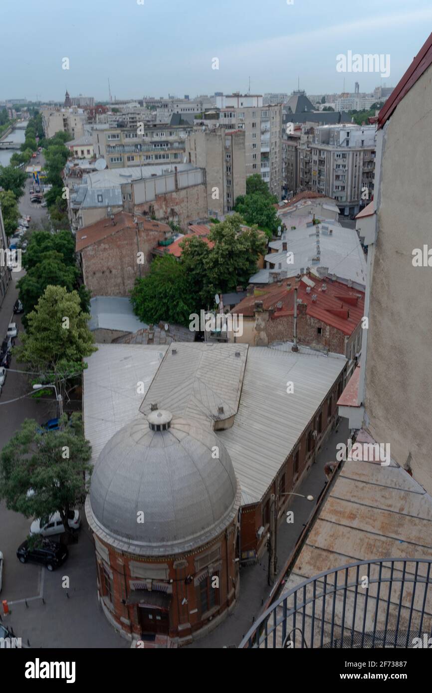 The view from the top of old buildings in downtown with a triangular ...