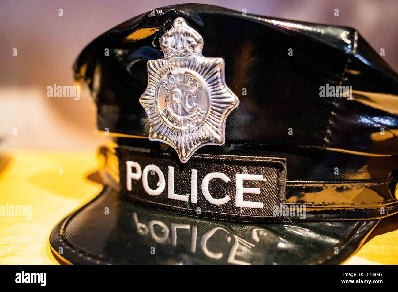 Black police patrol cap close up with logo nobody Stock Photo - Alamy