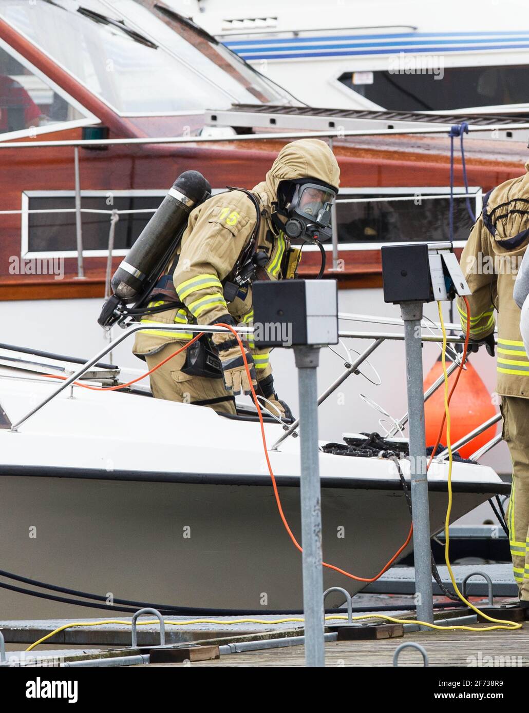The rescue service's smoke divers on a boat after a boat fire Stock ...