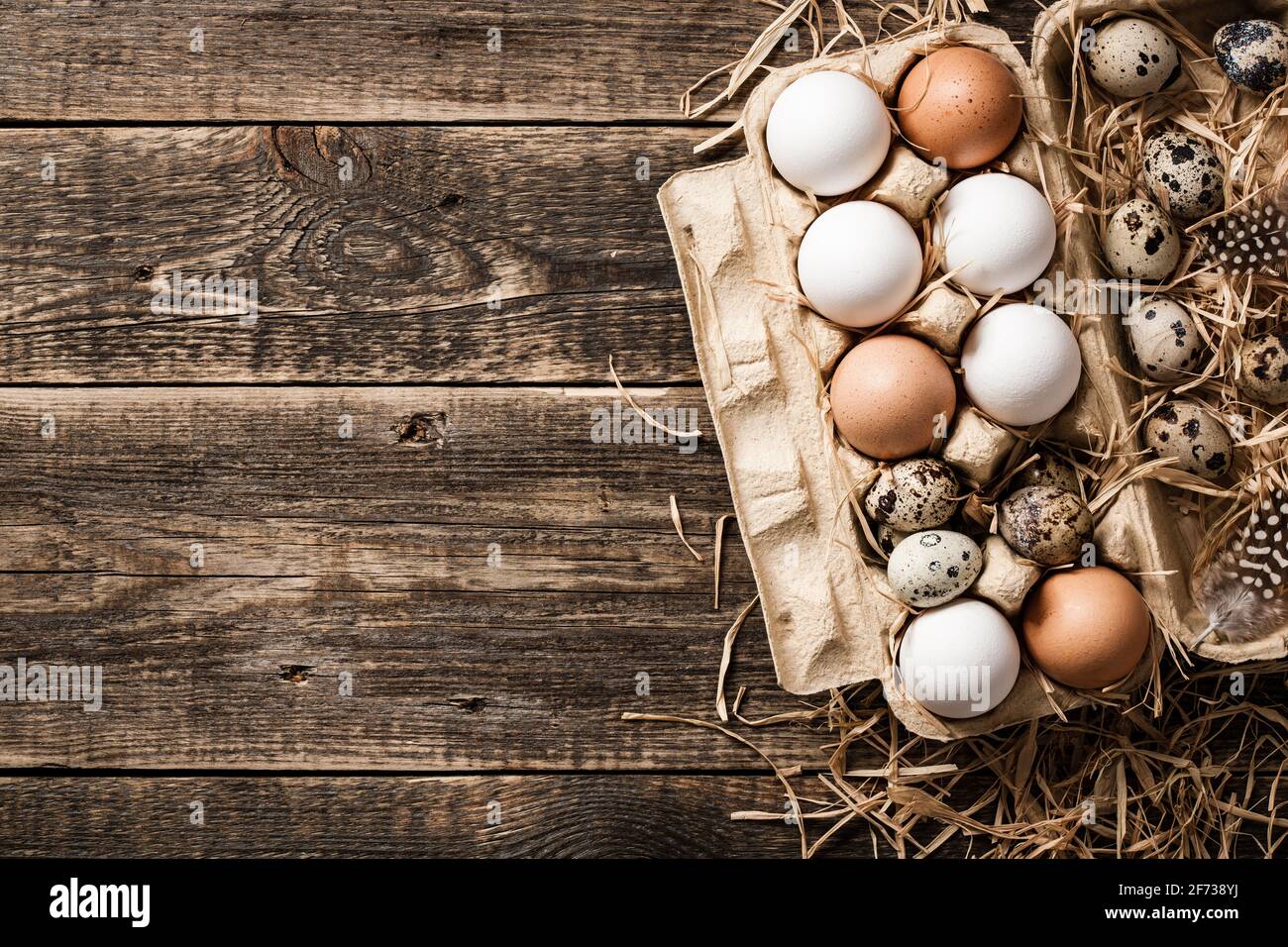 Fresh rustic eggs in cardboard egg box Stock Photo - Alamy