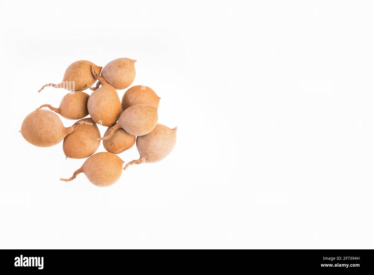 Tamarind tropical fruit - Tamarindus indica. White background Stock ...