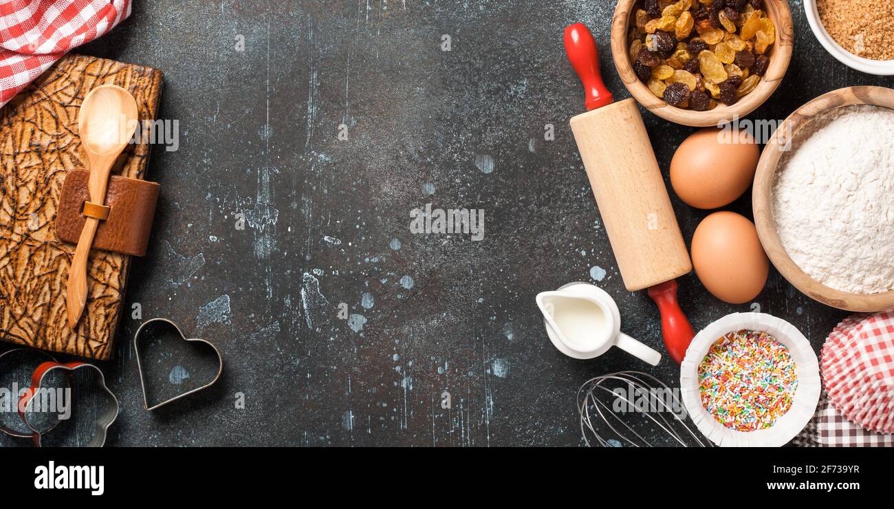 Baking table with ingredients and cookbook Stock Photo - Alamy