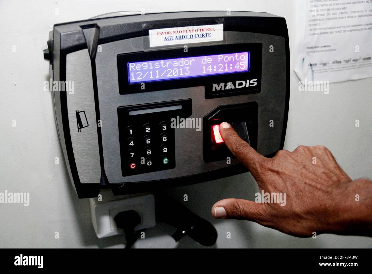 salvador, bahia / brazil - november 12, 2013: worker is seen making ...