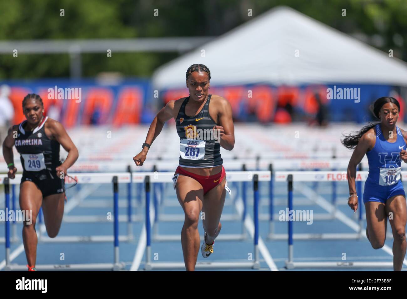 USC freshman Jasmine Jones leads in the third heat of the women's 100 ...